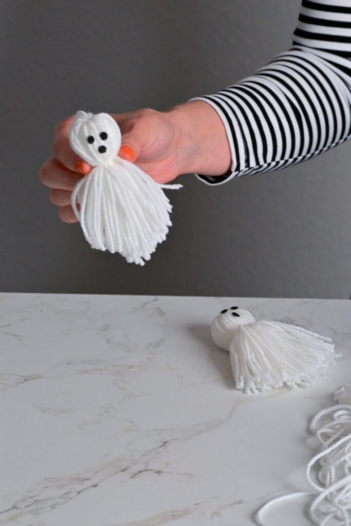Simple DIY Yarn Ghost Garland - Craft · Share · Play