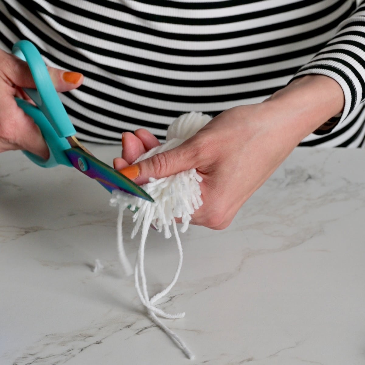 Simple DIY Yarn Ghost Garland - Craft · Share · Play